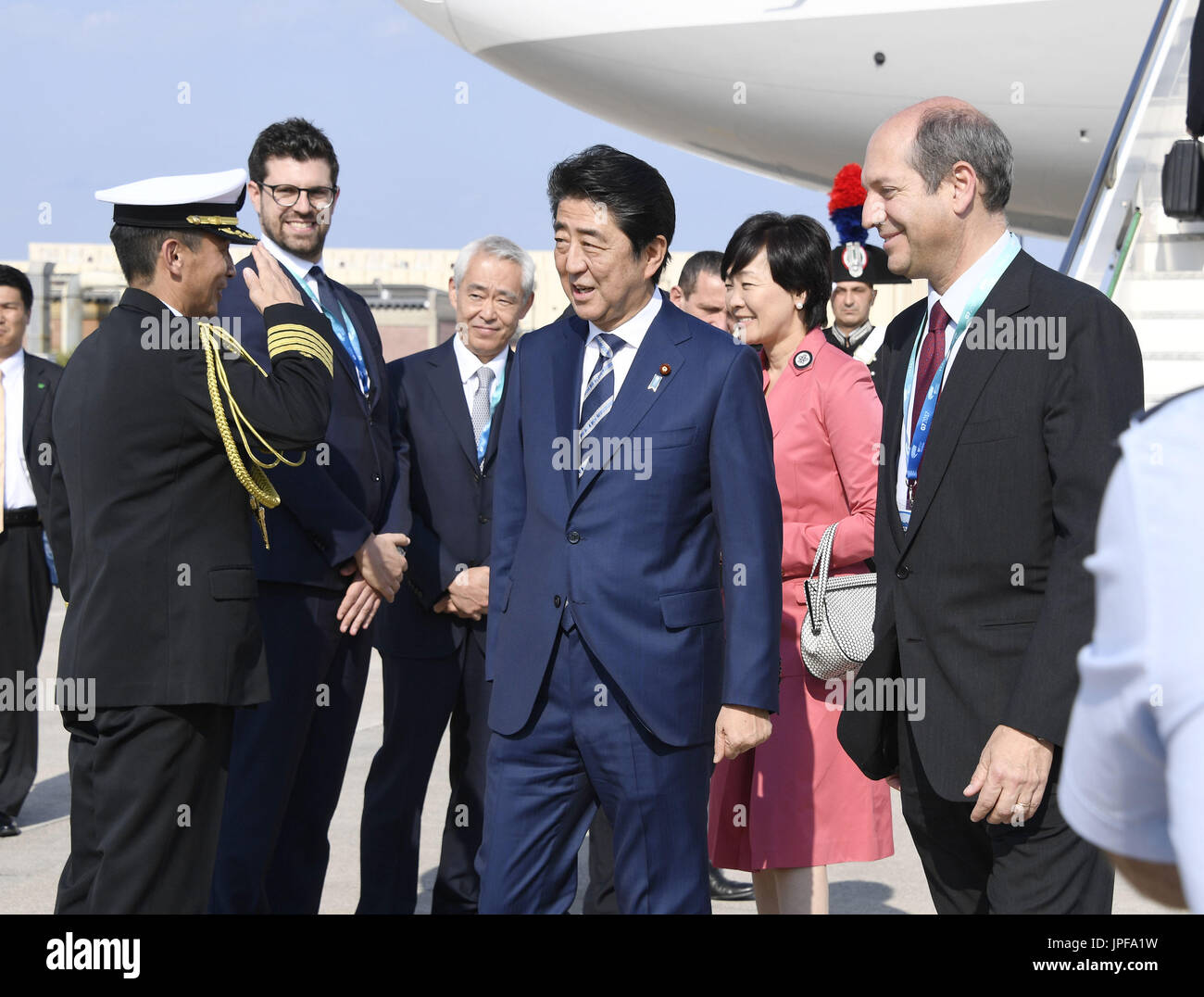 Japan's Prime Minister Shinzo Abe, together with his wife Akie, arrives ...
