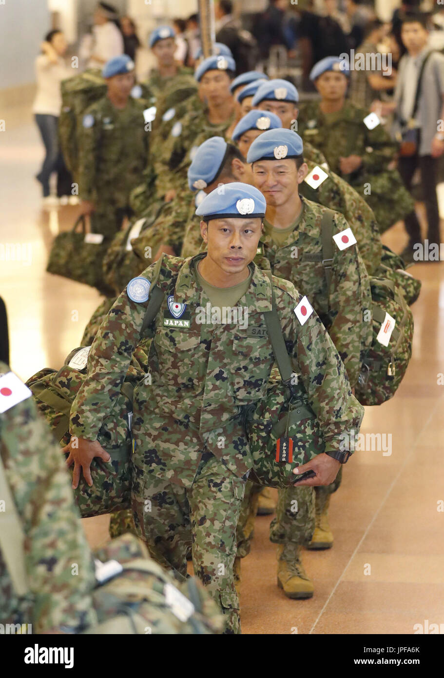 Japanese Ground Self-Defense Force personnel arrive at Tokyo's Haneda ...