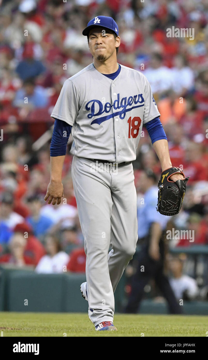 Los Angeles Dodgers pitcher Kenta Maeda walks back to the dugout after ...