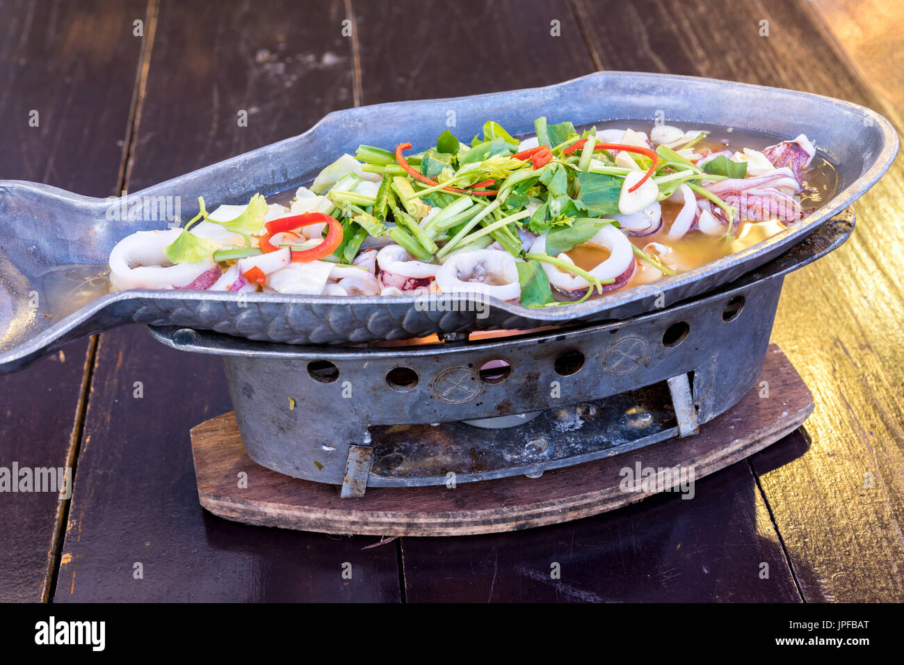 steamed octopus with lime spicy sauce Stock Photo - Alamy