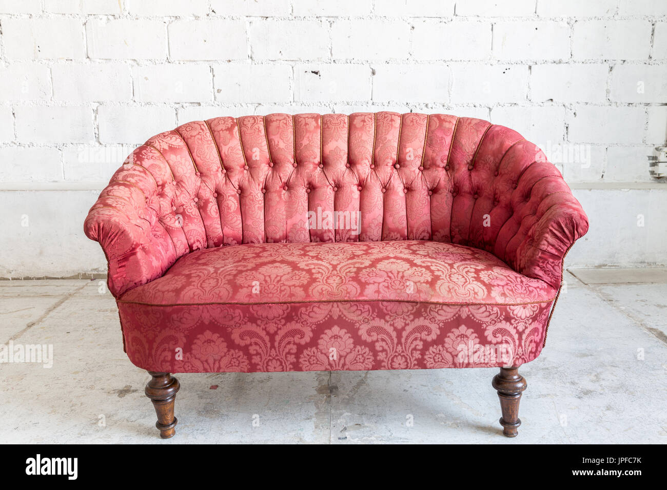 Red sofa couch in vintage room - classical style Stock Photo - Alamy
