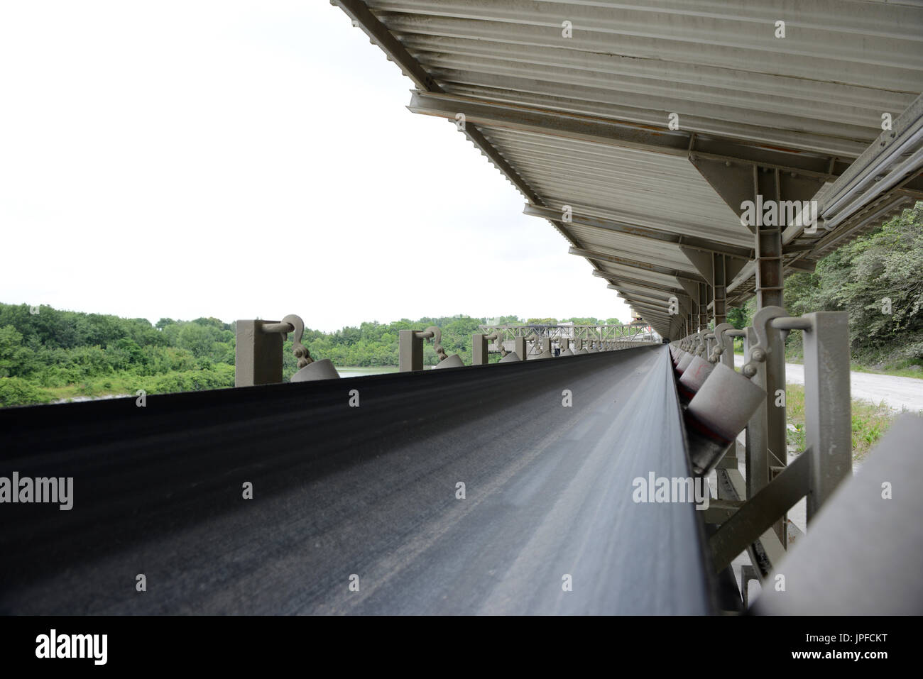 conveyor belt in a mine. mining industry Stock Photo - Alamy