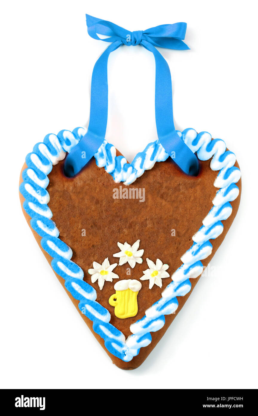 Oktoberfest gingerbread heart cake with copy space on white isolated ...