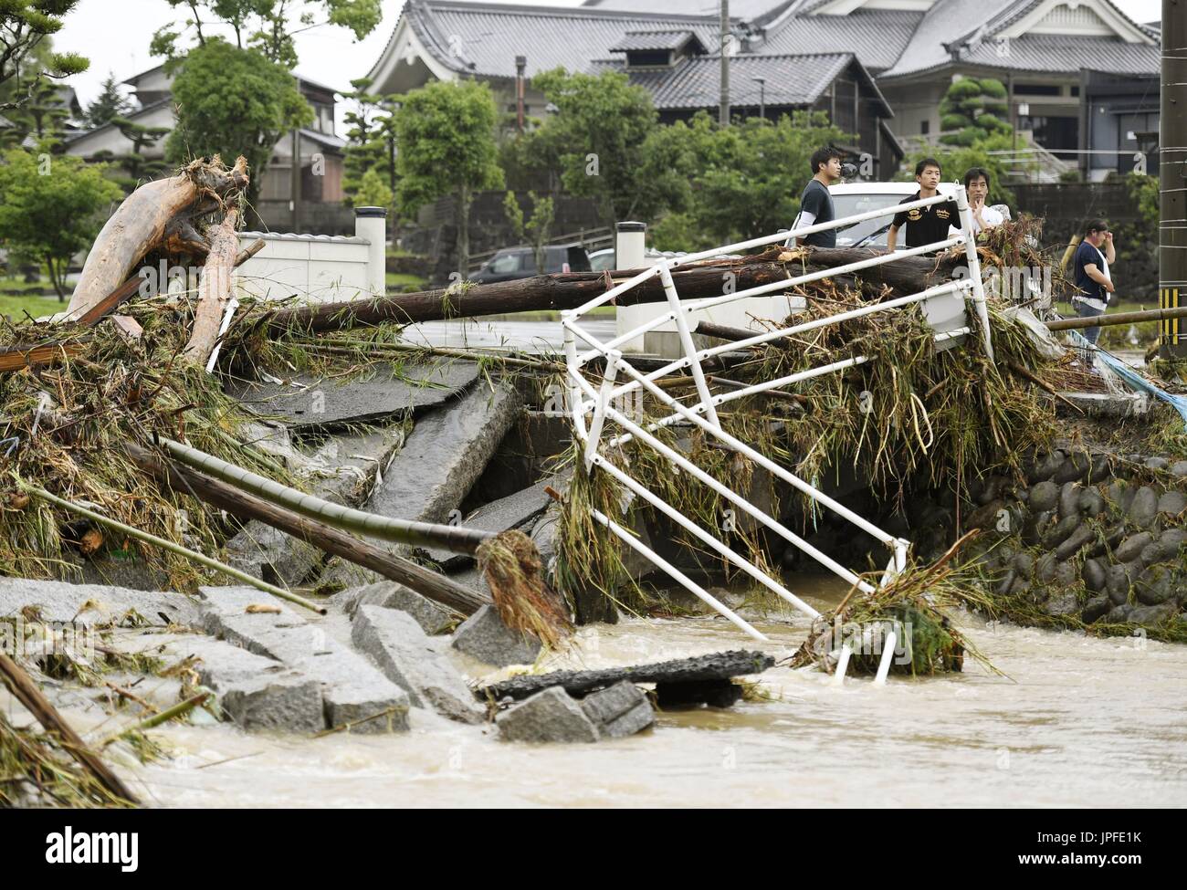 A bridge in the city of Asakura is seen destroyed on July 6, 2017 ...