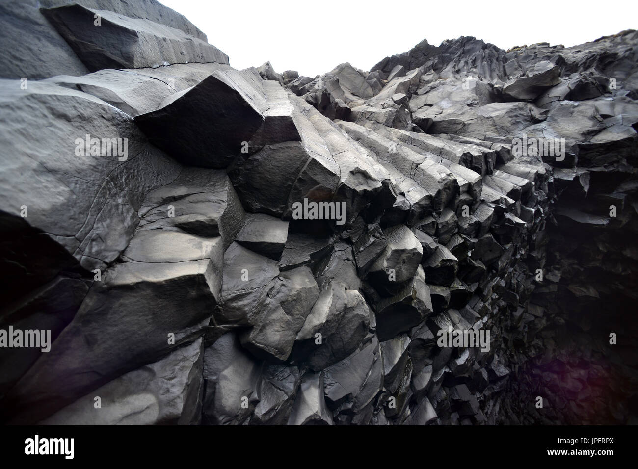 Volcanic rock pillars in Iceland Stock Photo - Alamy