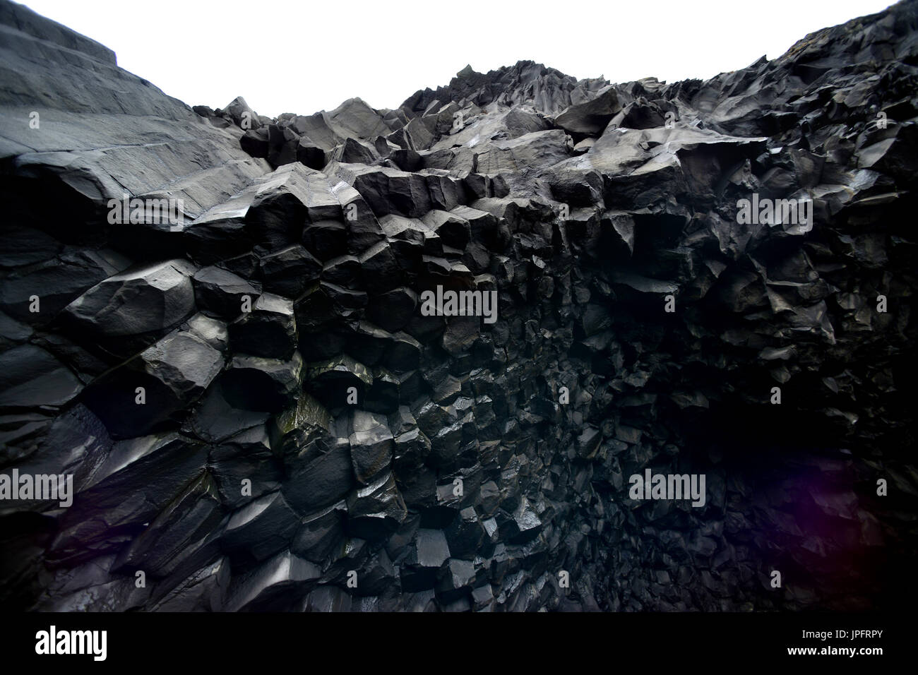 Volcanic rock pillars in Iceland Stock Photo - Alamy