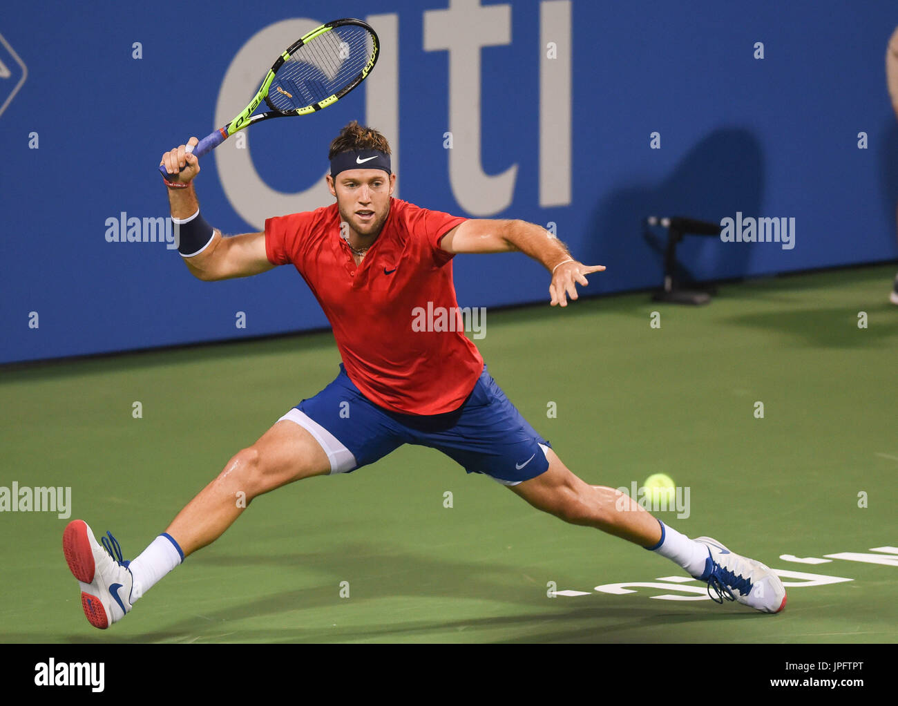 Washington, D.C, USA. 1st Aug, 2017. JACK SOCK stretches for a forehand ...