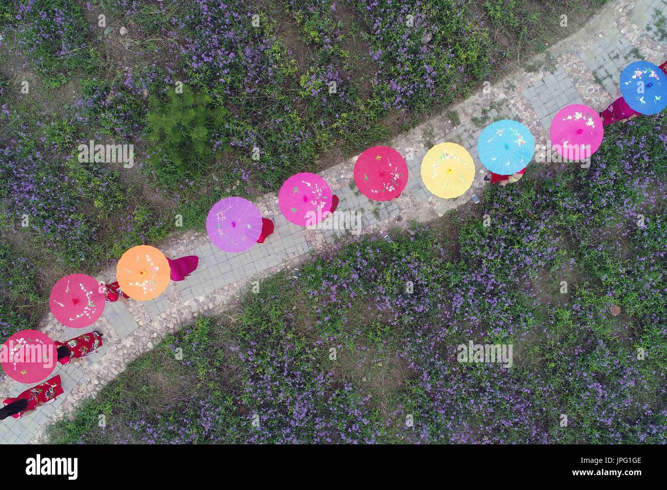 Shahe, China's Hebei Province. 2nd Aug, 2017. Women present cheongsam ...