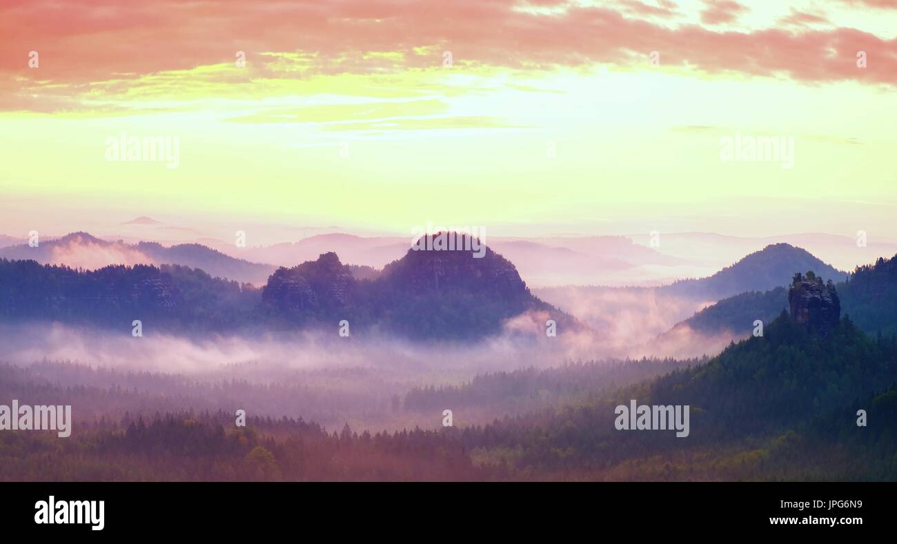 Red misty landscape panorama in mountains. Fantastic dreamy sunrise on ...