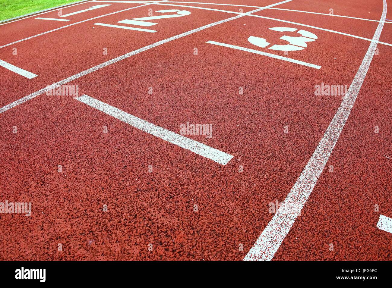 Start line. Red running racetrack on the outdoor athletic stadium Stock ...