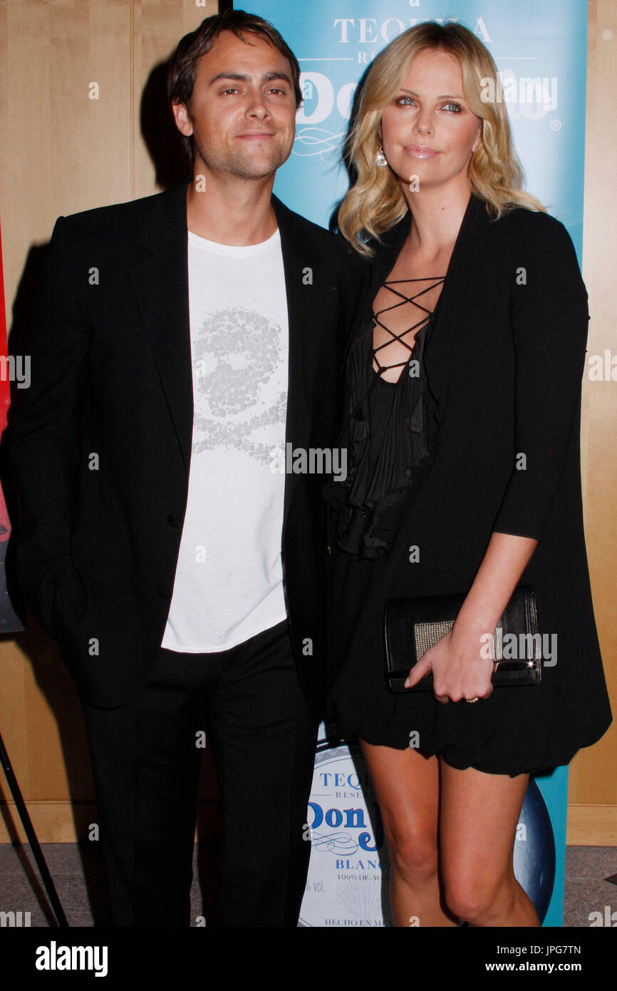 (l-r) Stuart Townsend and Charlize Theron at the Redwood Palms Pictures ...