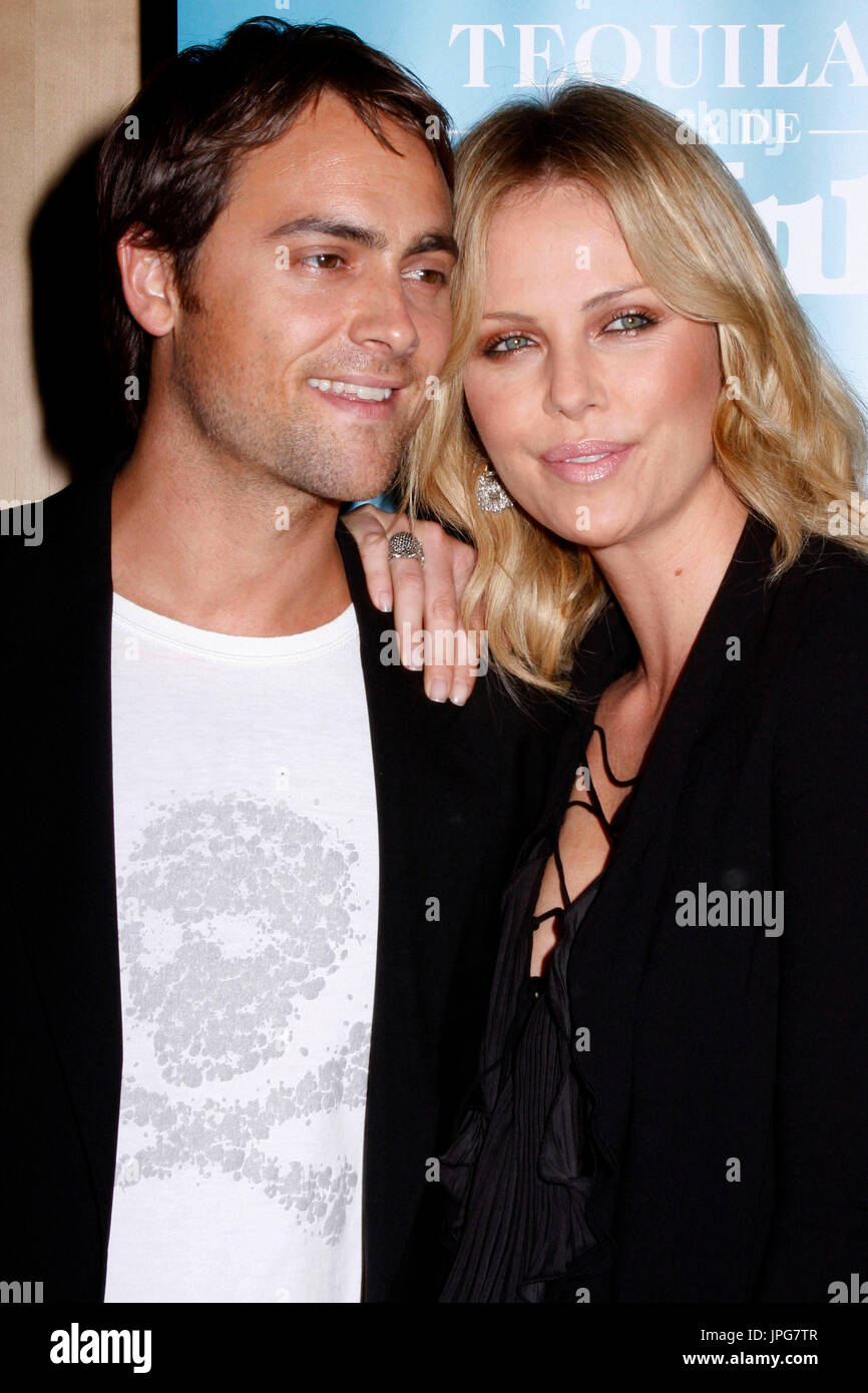 (l-r) Stuart Townsend and Charlize Theron at the Redwood Palms Pictures ...