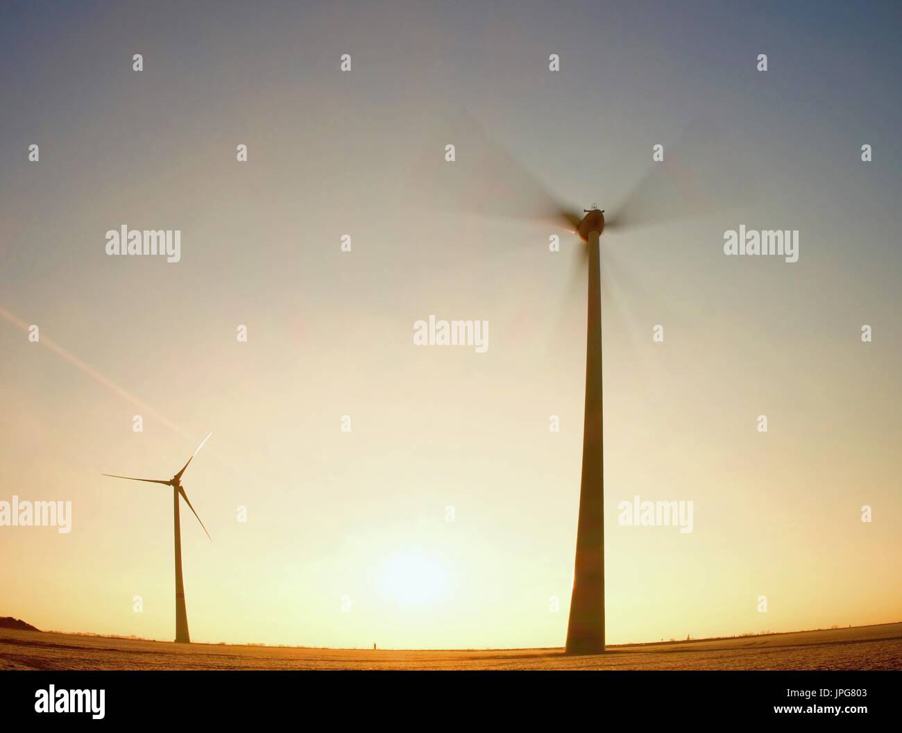 Wind Turbines Producing Electric Energy within sunny spring morning ...