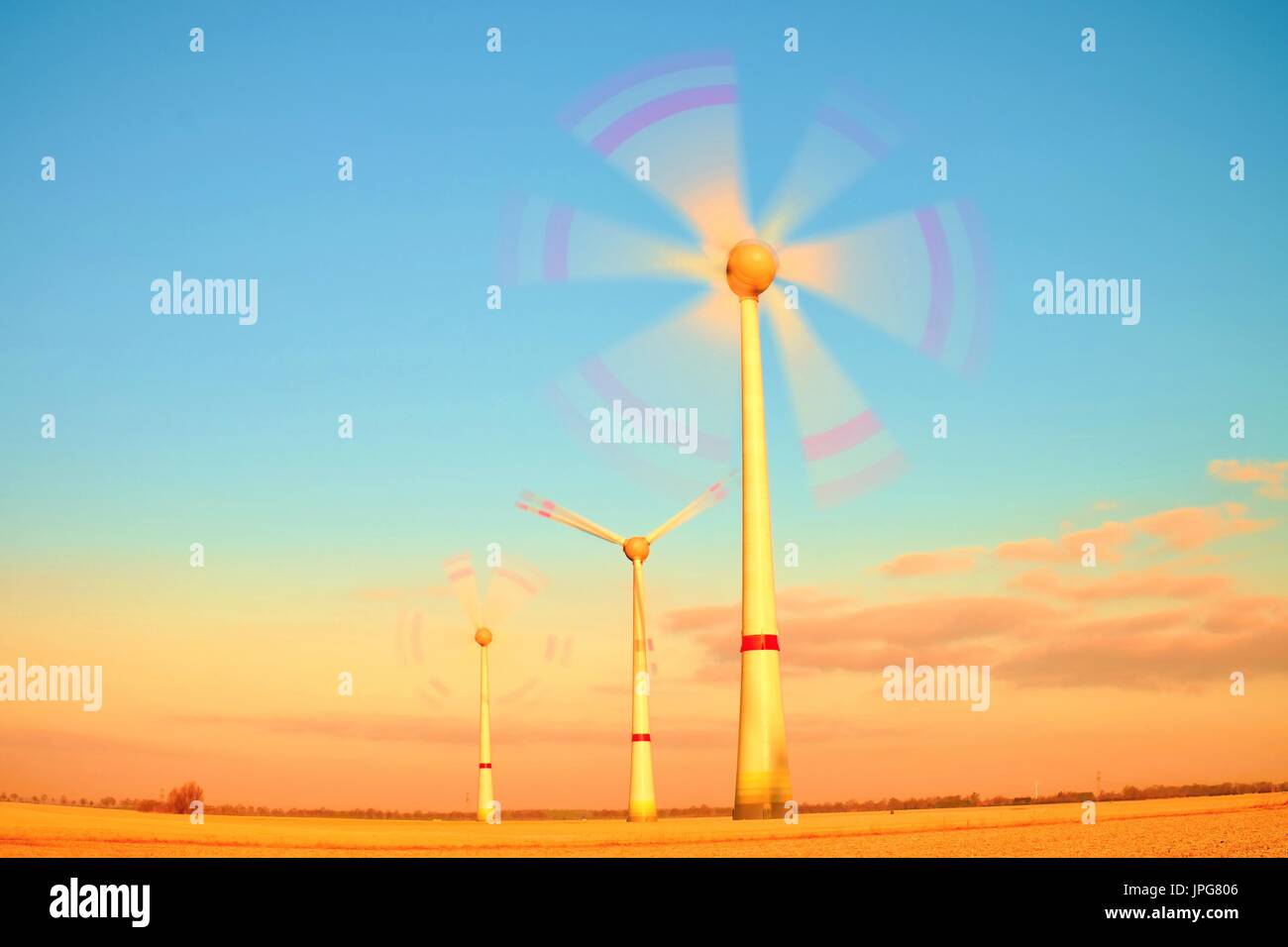 Wind Turbines Producing Electric Energy within sunny spring morning ...