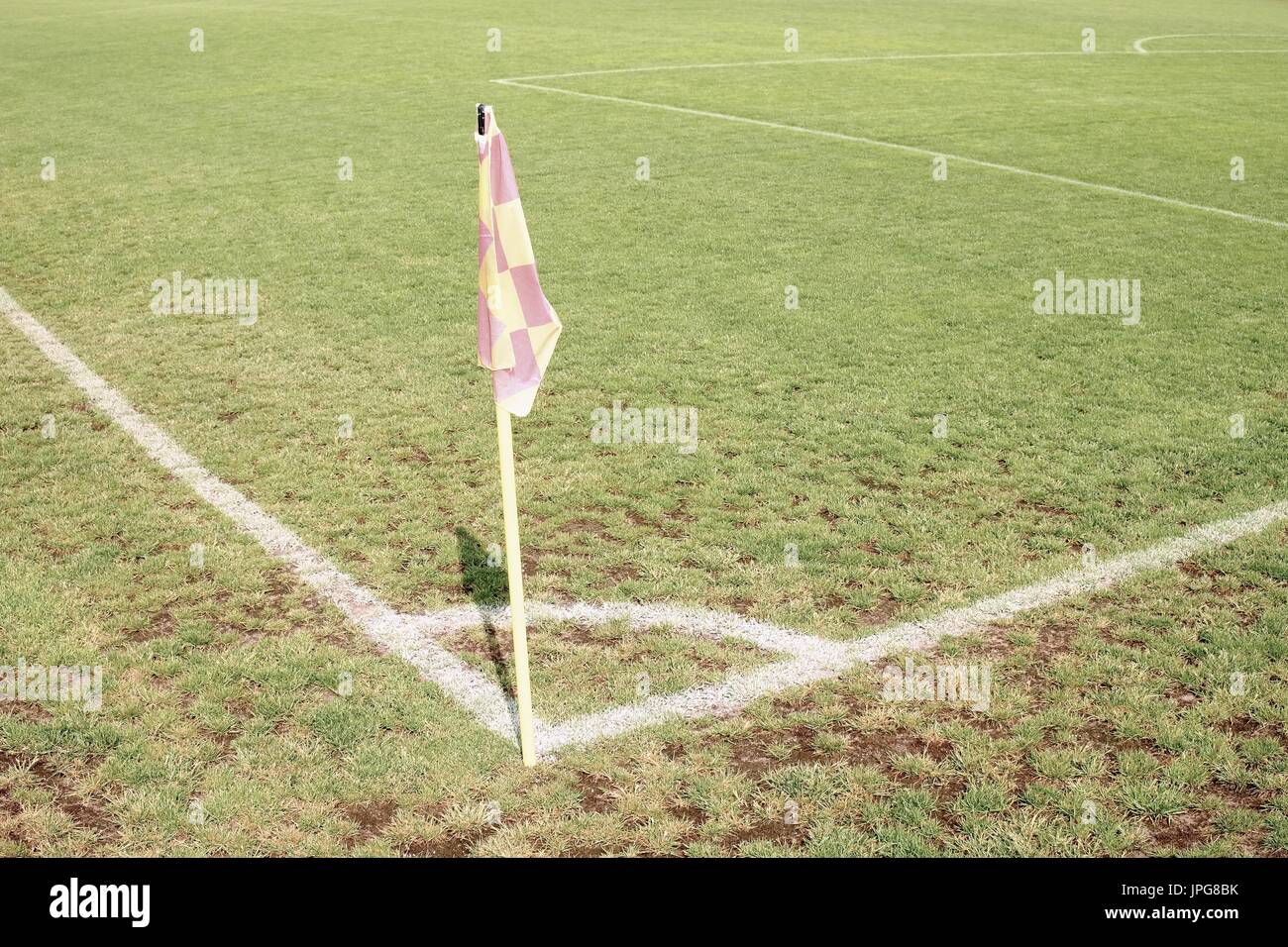 Yellow flag in corner of football playground, lazy wind blowing Stock ...
