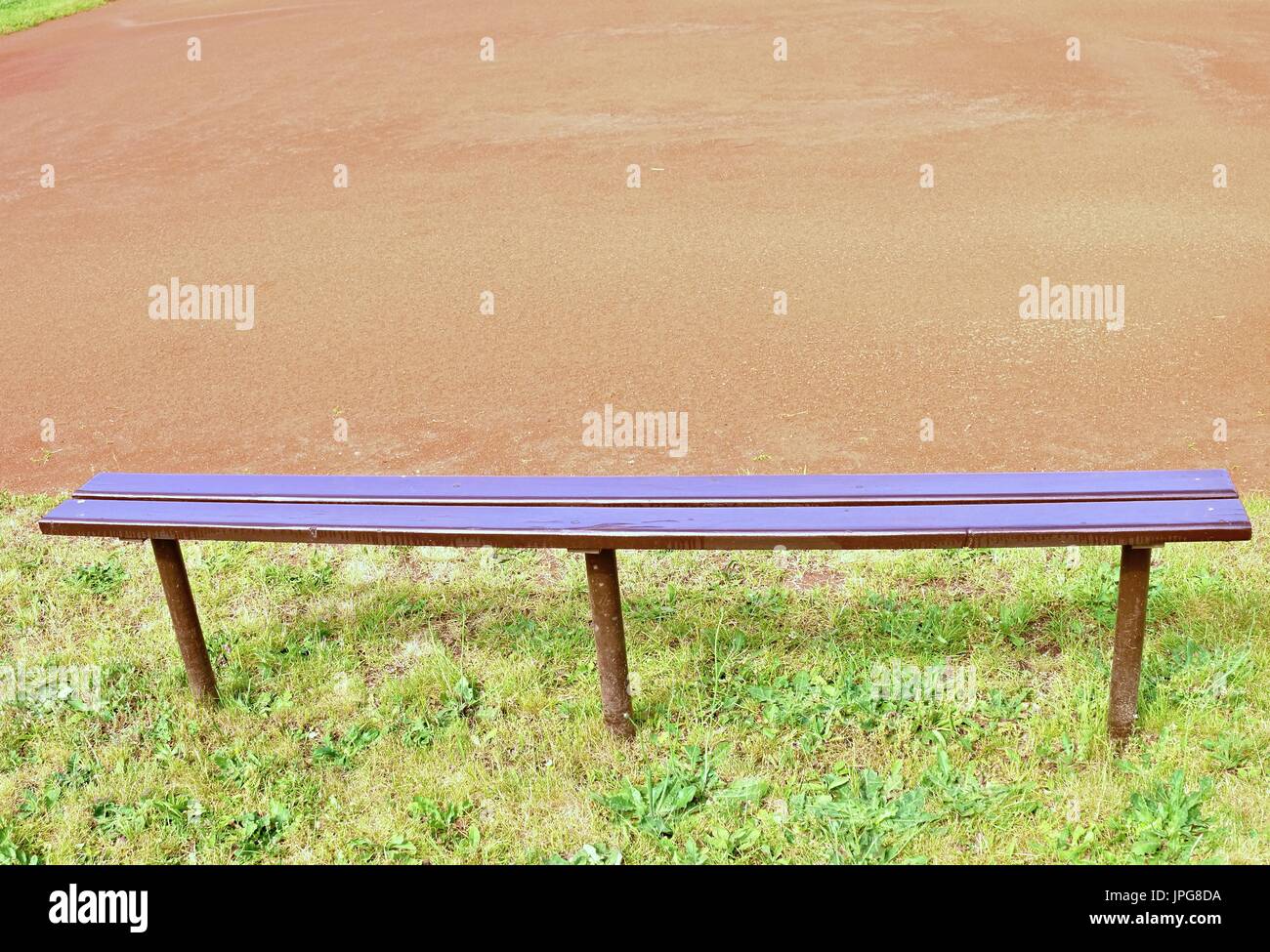 Wooden bench, empty seats on outdoor tennis court. Stadium bench with ...