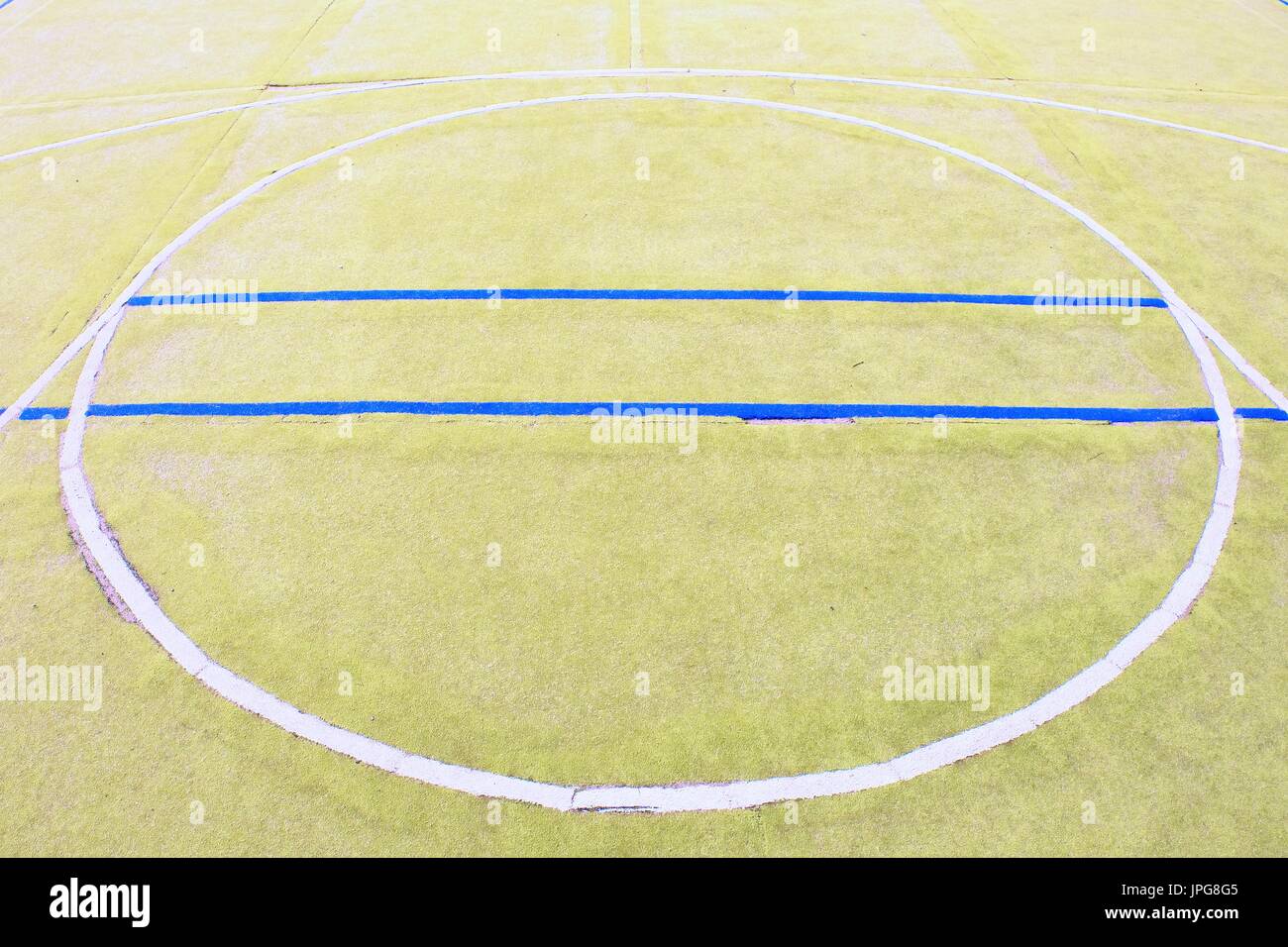 Circle in middle of court. Empty outdoor handball playground, plastic ...