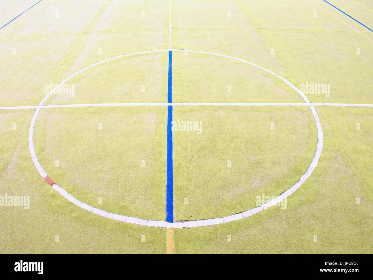 Circle in middle of court. Empty outdoor handball playground, plastic ...