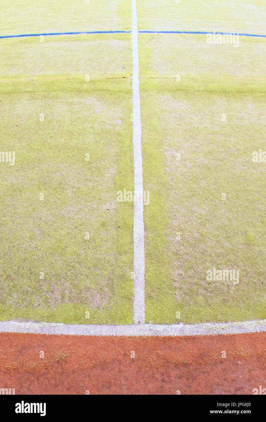 Worn out plastic hairy carpet on outside hanball court. Floor of sports ...
