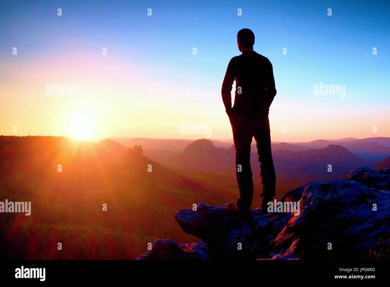 Tourist on sharp peak hi-res stock photography and images - Alamy