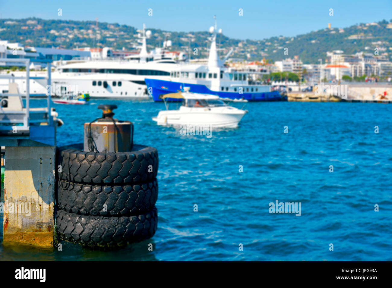 a view of the Port of Cannes, in the French Riviera, with a rusty dock ...