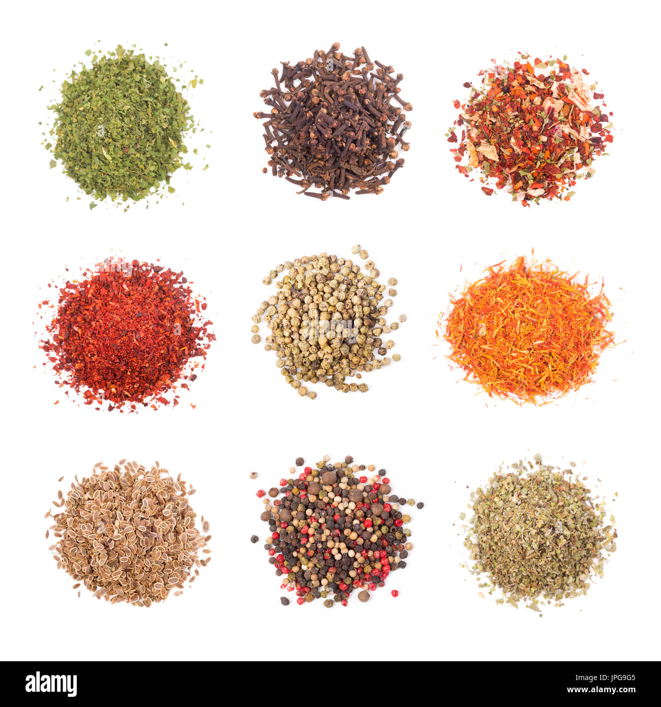 A collection of different spices on white background Stock Photo - Alamy