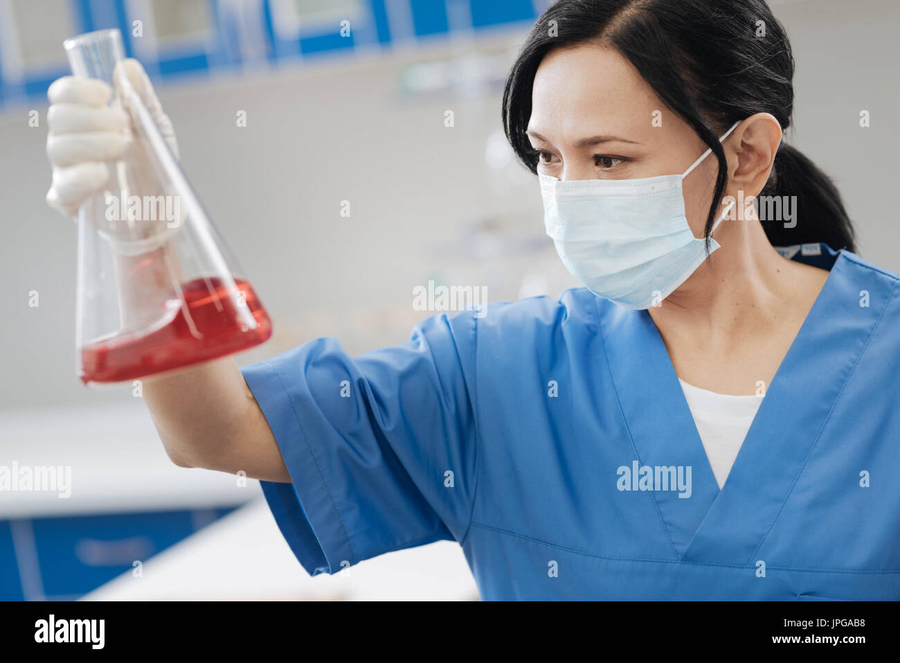 Intelligent professional chemist working in the lab Stock Photo - Alamy
