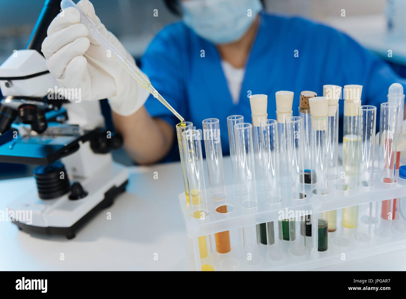 Medical research test tubes microscope hi-res stock photography and ...