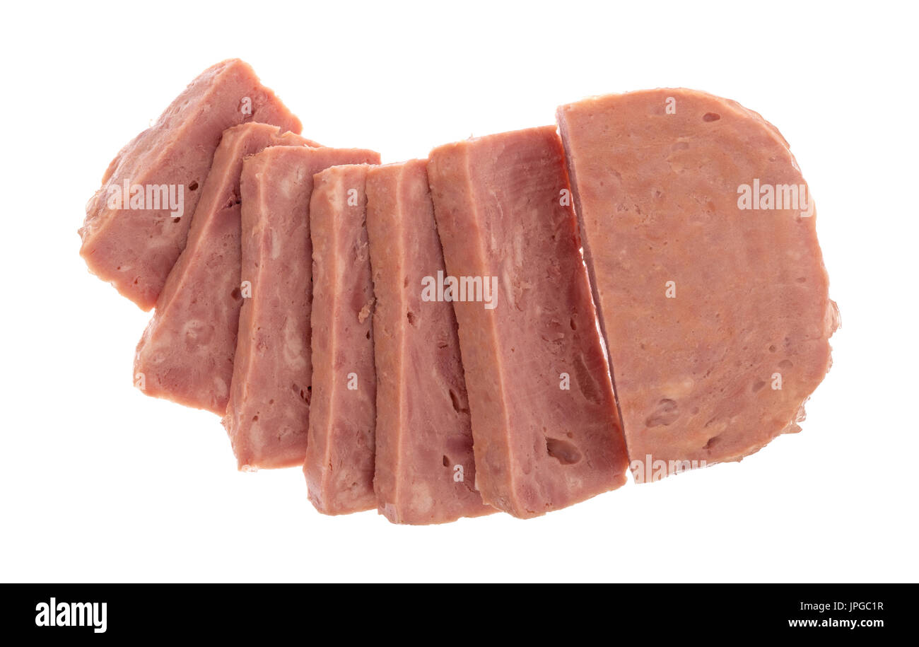 Top view of several thick slices of a whole canned ham isolated on a ...