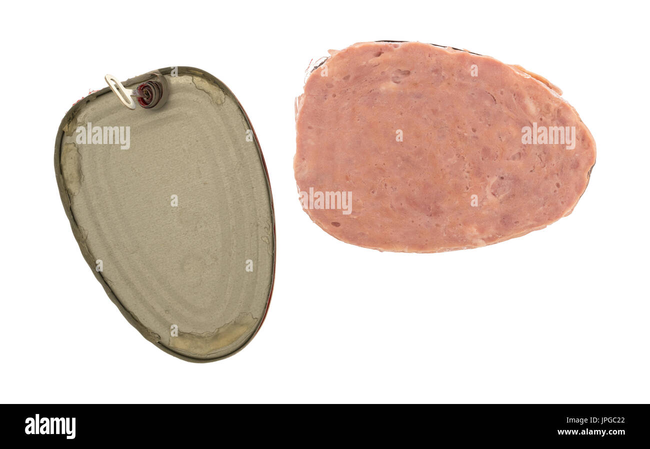 Top view of an opened whole canned ham still in the tin with the lid ...