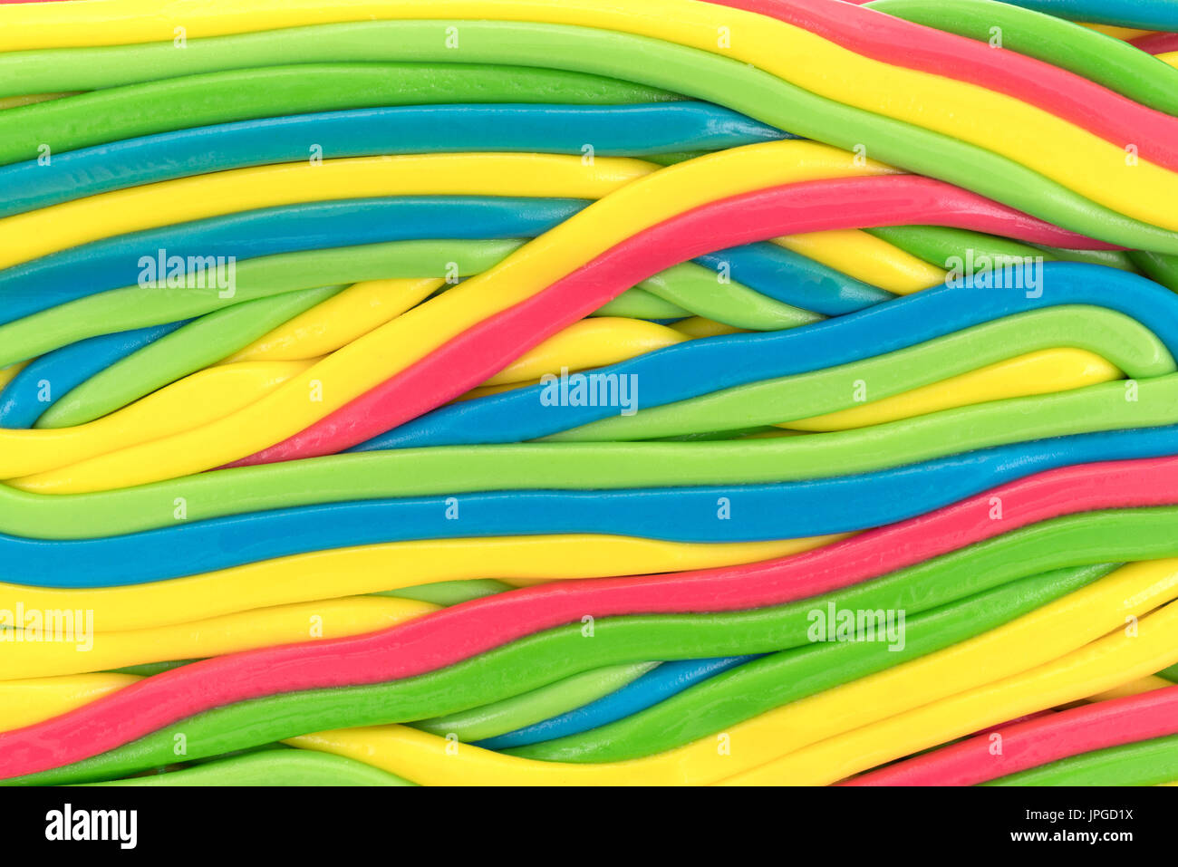 Close view of several colorful candy strings Stock Photo - Alamy