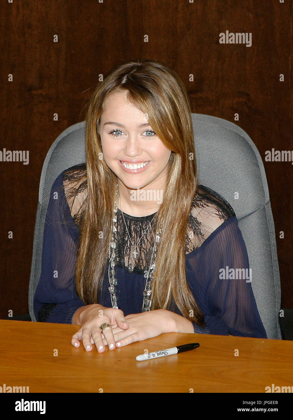 Miley Cyrus at her book launch for MILES TO GO held at Barnes and Noble ...