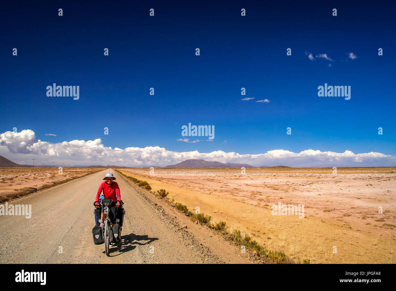 Bolivian woman with bike hi-res stock photography and images - Alamy