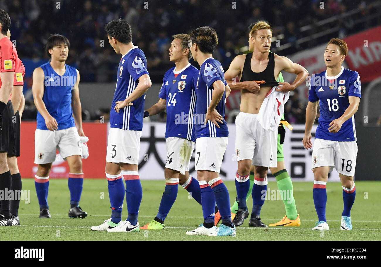 Japan players are pictured after a 1-1 draw against Syria in a friendly ...
