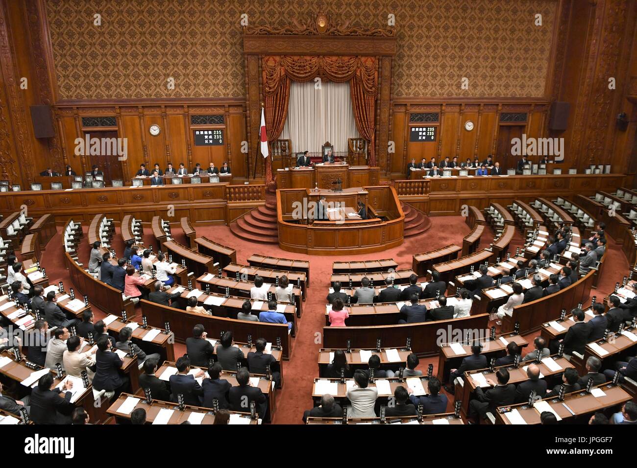 Japan's parliament enacts a law at the House of Councillors' plenary ...