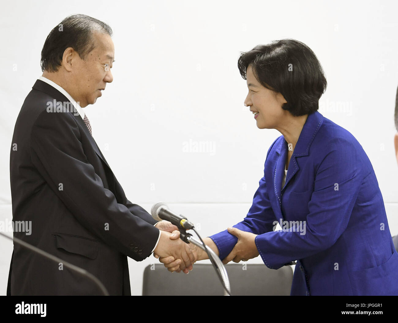 Toshihiro Nikai (L), secretary general of Japan's ruling Liberal ...