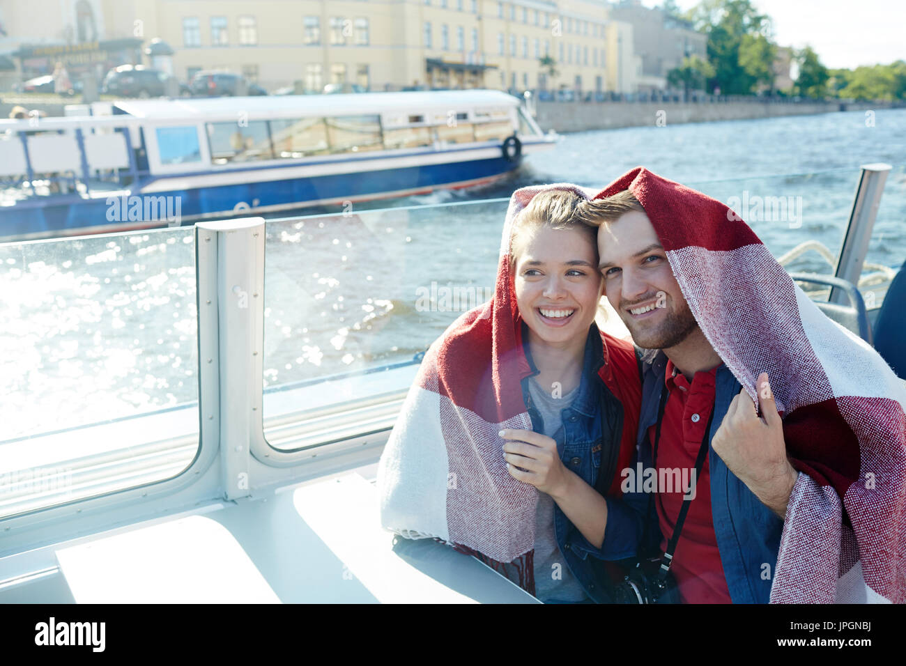 Couple in plaid floating in steamship on summer day Stock Photo - Alamy
