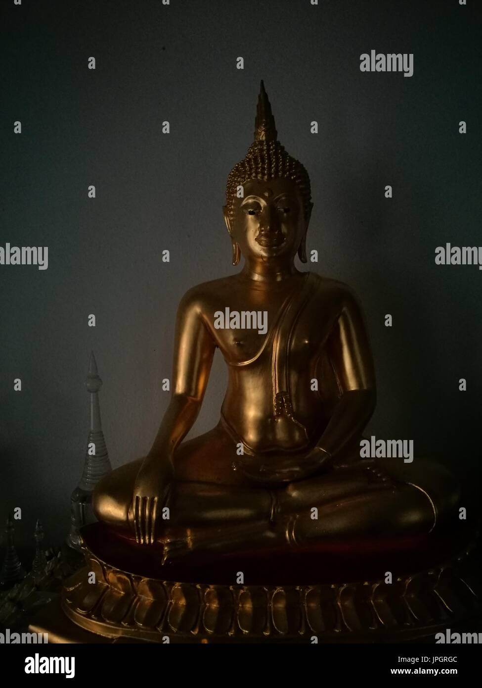 High contrast image of beautiful buddha statue Stock Photo - Alamy