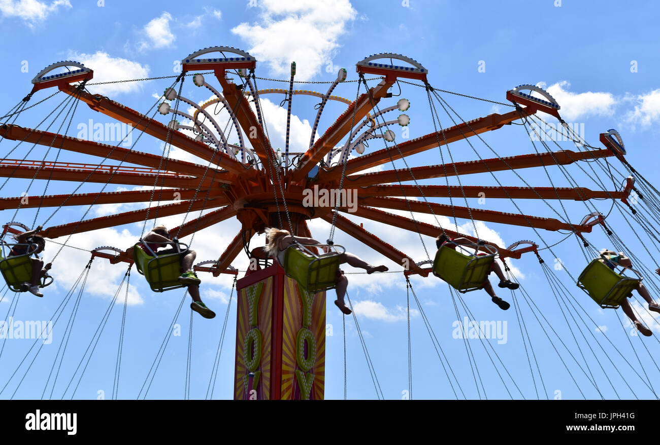 Swing ride at a carnival Stock Photo - Alamy