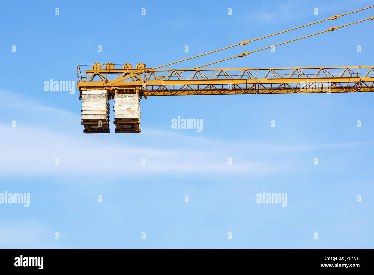 The counterweight of the tower crane at work Stock Photo - Alamy