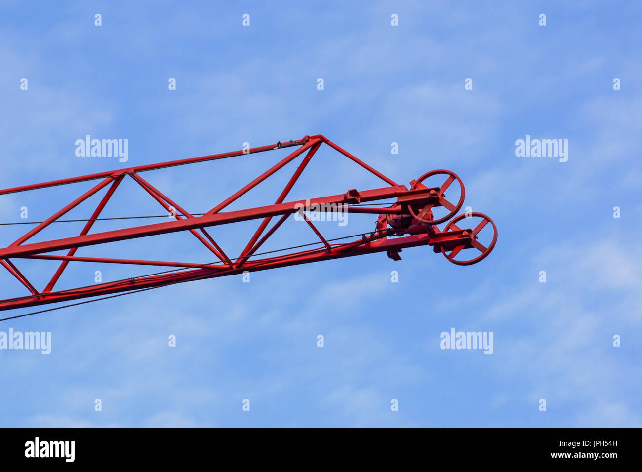 crane tower on sky background at construction site Stock Photo - Alamy