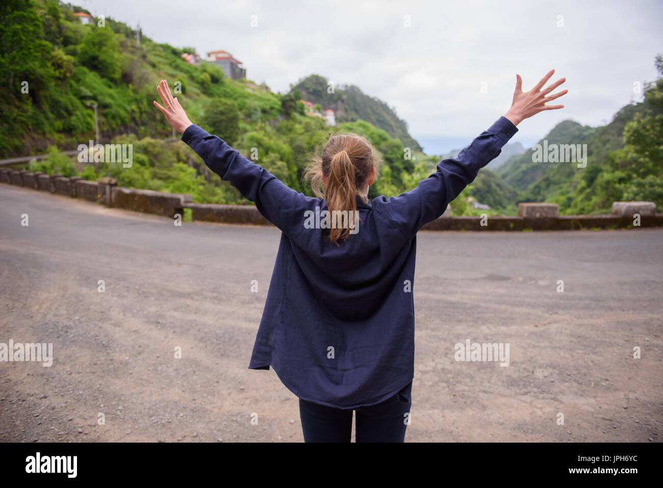 Woman with hands up hi-res stock photography and images - Alamy