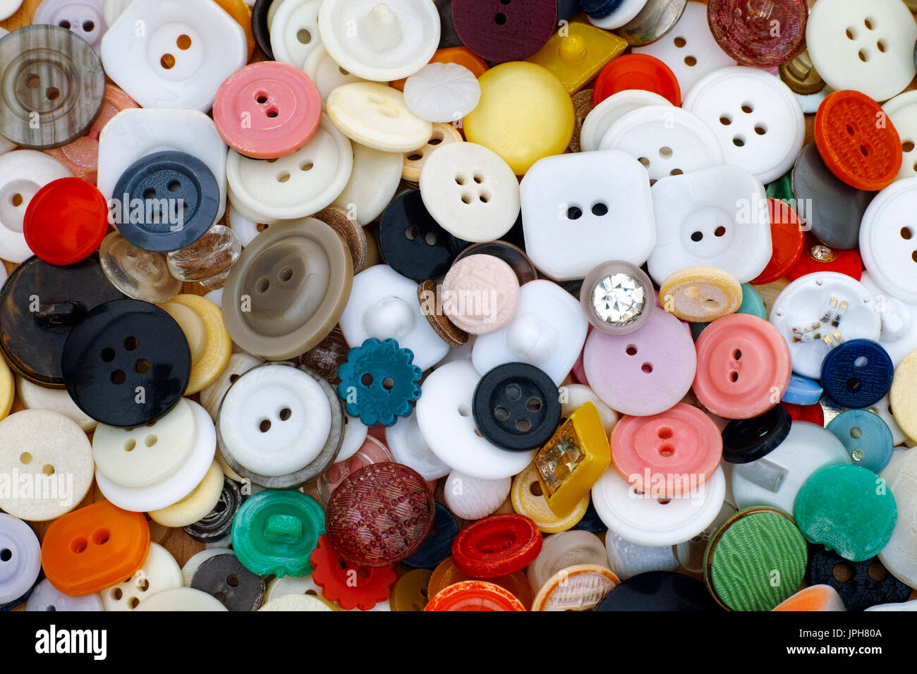 Sewing buttons background. Full frame Stock Photo - Alamy