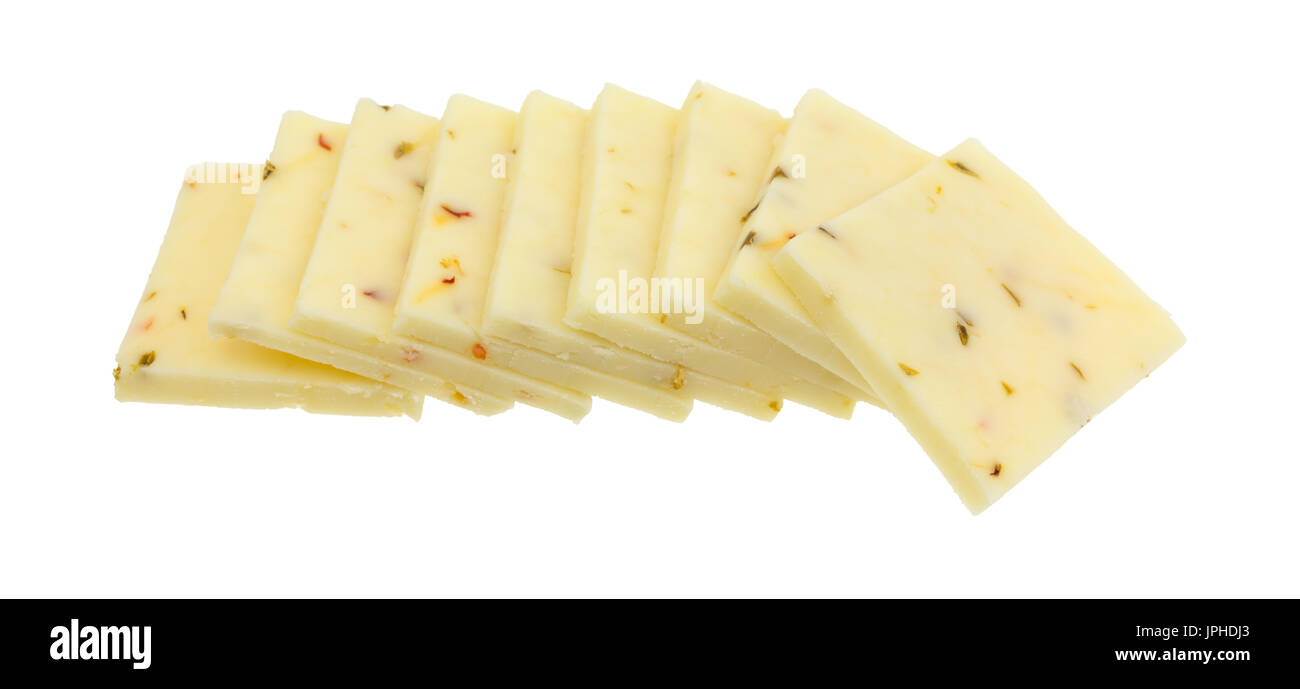 Small group of fresh pepper jack cheese squares in a row isolated on a ...