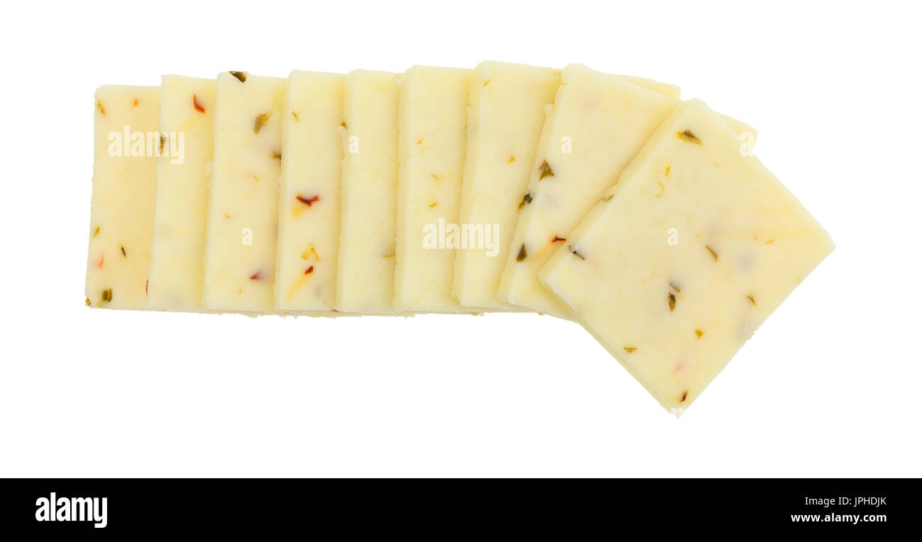 Top view of a small group of fresh pepper jack cheese squares in a row ...