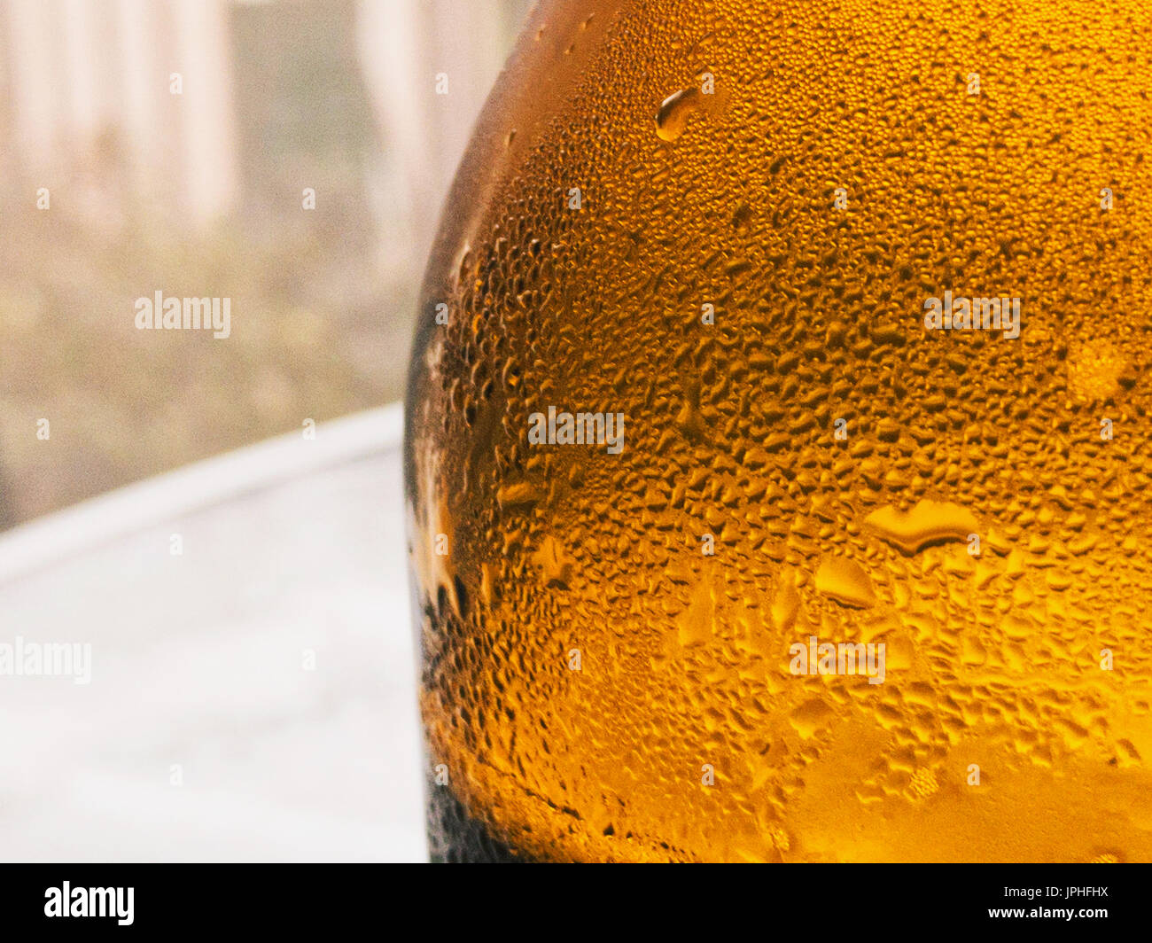 Beer bottle in close up, horizontal image Stock Photo - Alamy