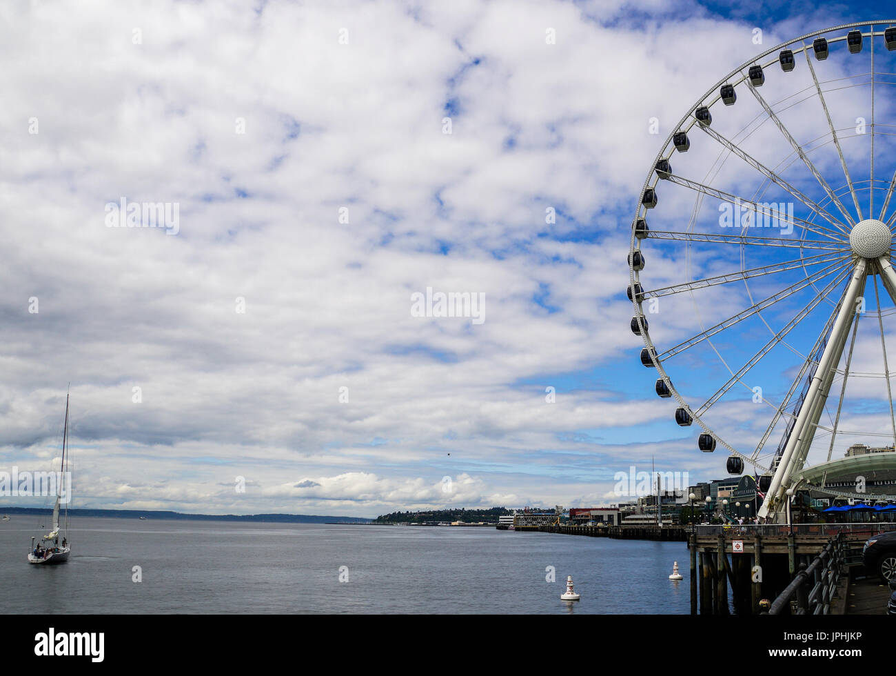 Waterfront Ferris wheel Stock Photo - Alamy