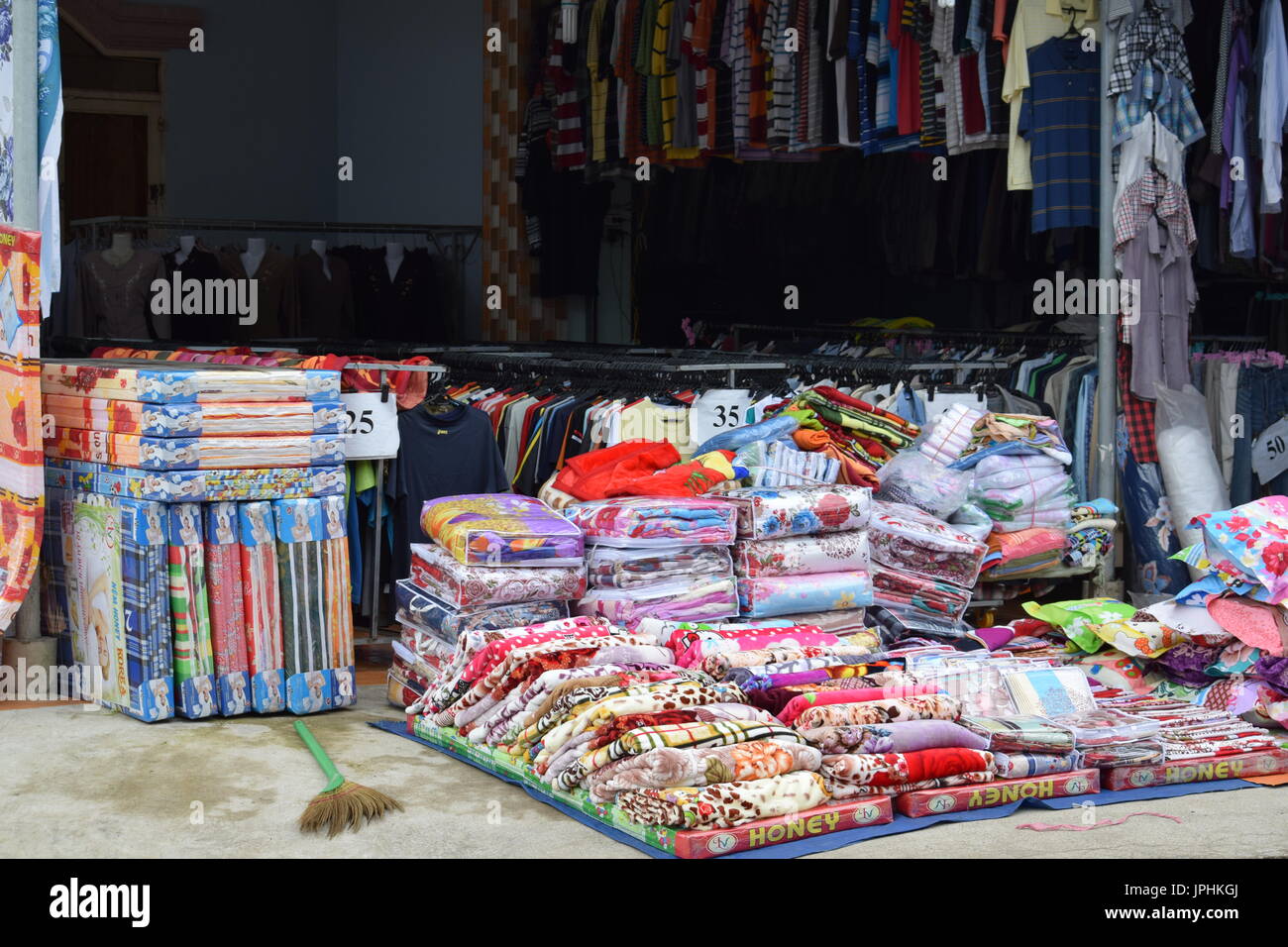Cloth on a market stall Stock Photo - Alamy