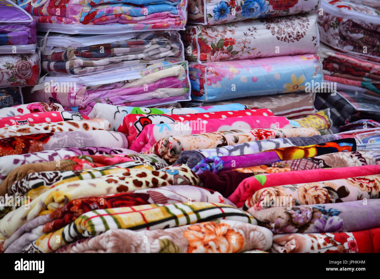 Cloth on a market stall Stock Photo - Alamy