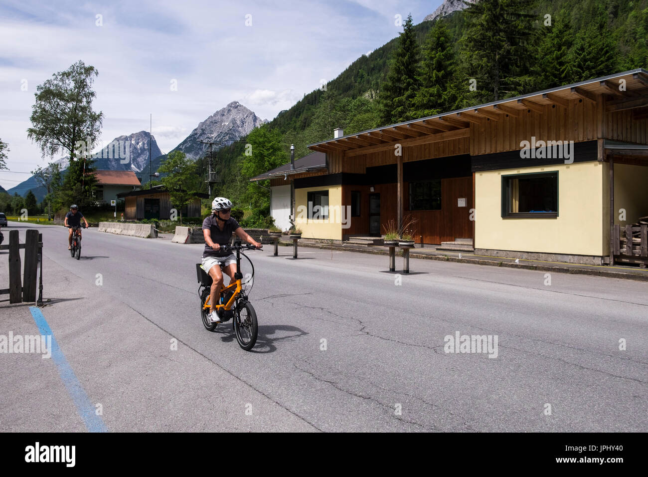 Crossing the border from Austria to Germany next to the disused border ...